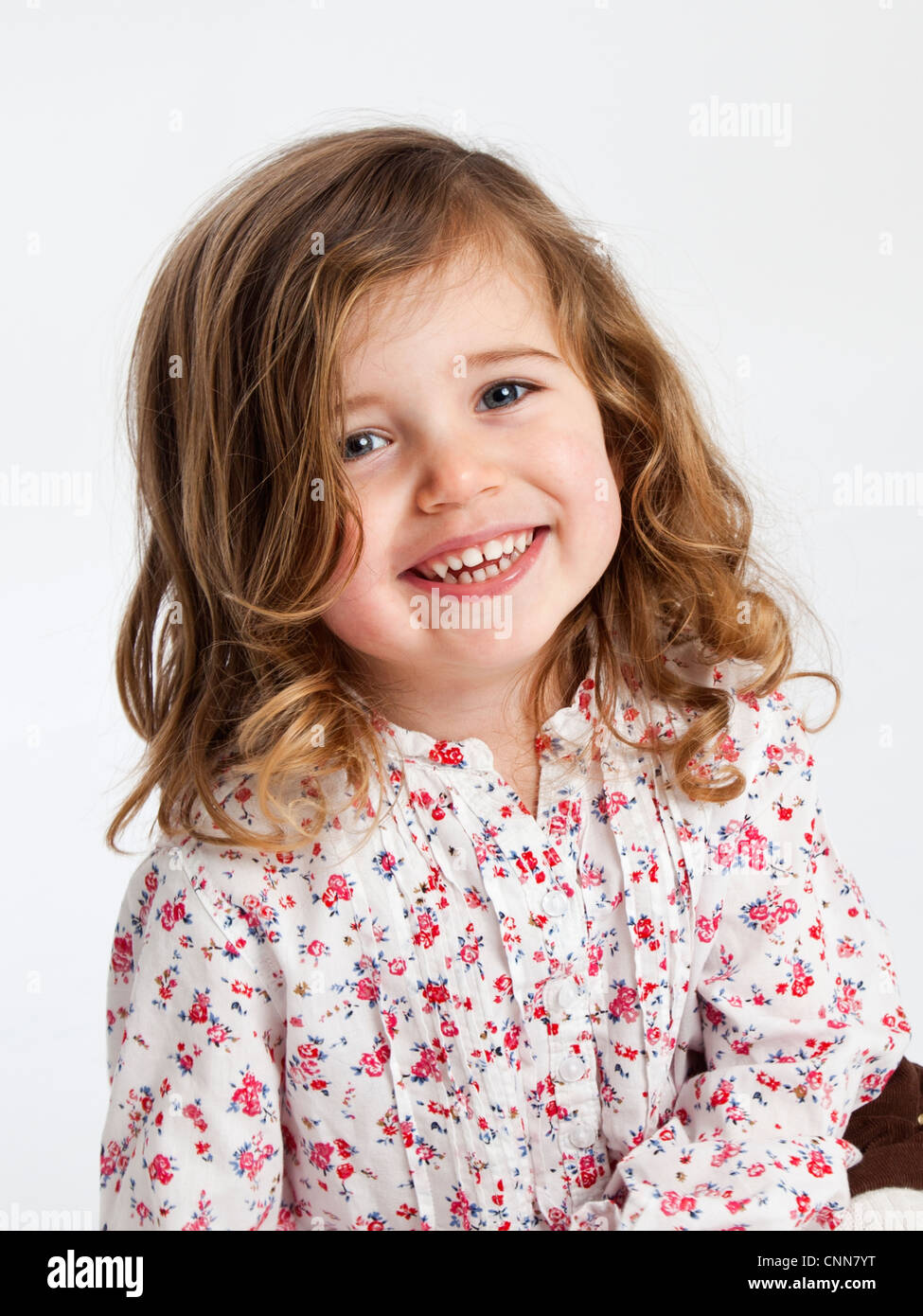 Three Year old pretty girl posing on a white background Stock Photo - Alamy