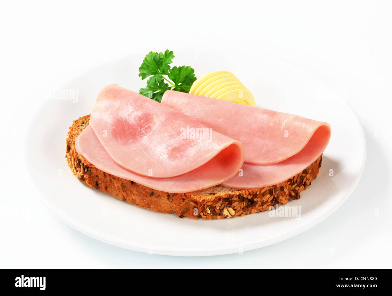 Whole wheat bread and ham Stock Photo - Alamy