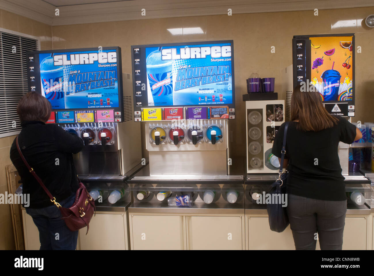 Customers make Slurpees in a 7-Eleven store in the Flatiron ...