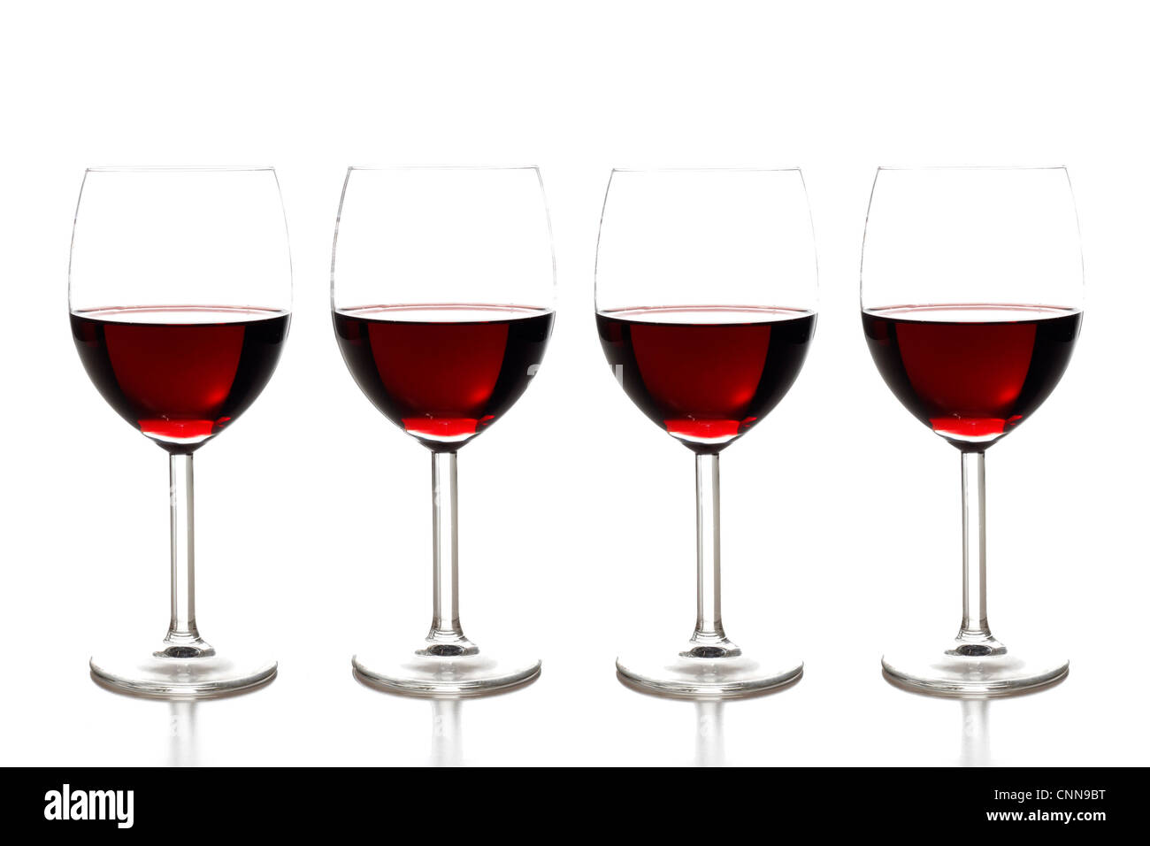 4 glasses of red wine Stock Photo - Alamy
