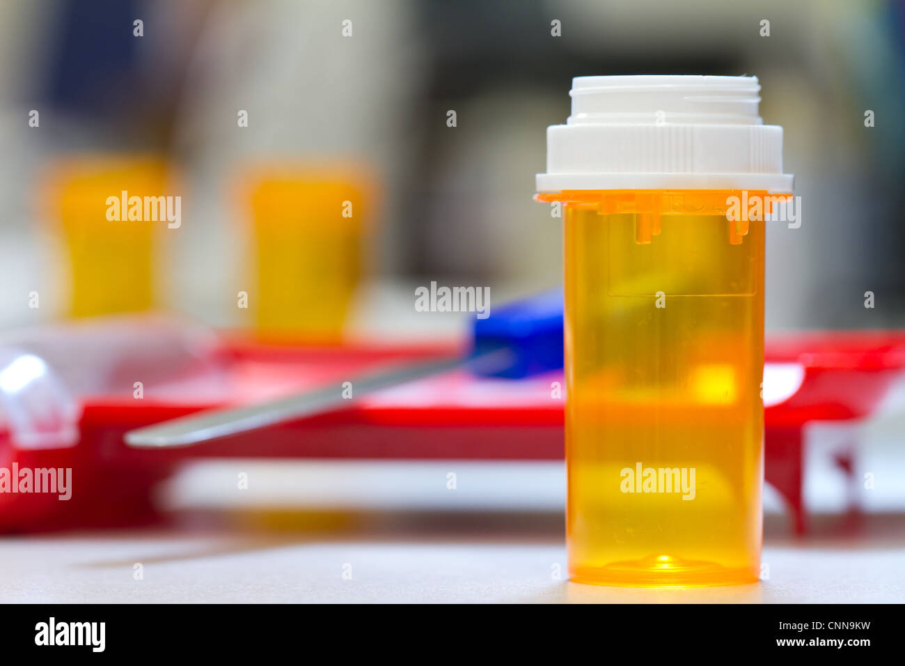 pharmacy bottle with a counting tray in the background, inside a ...