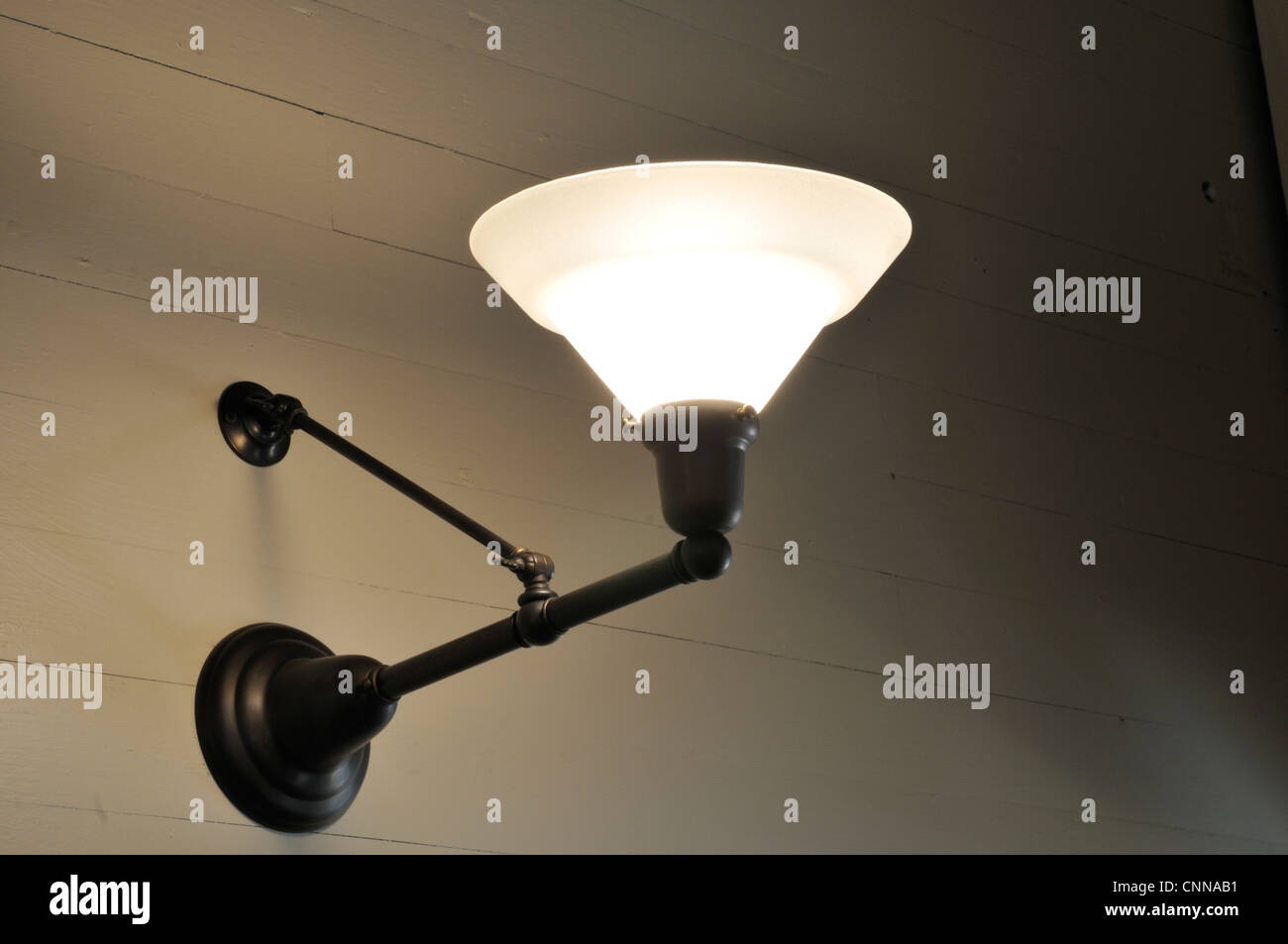 Electrified gas light in a restored cracker style house, part of the ...