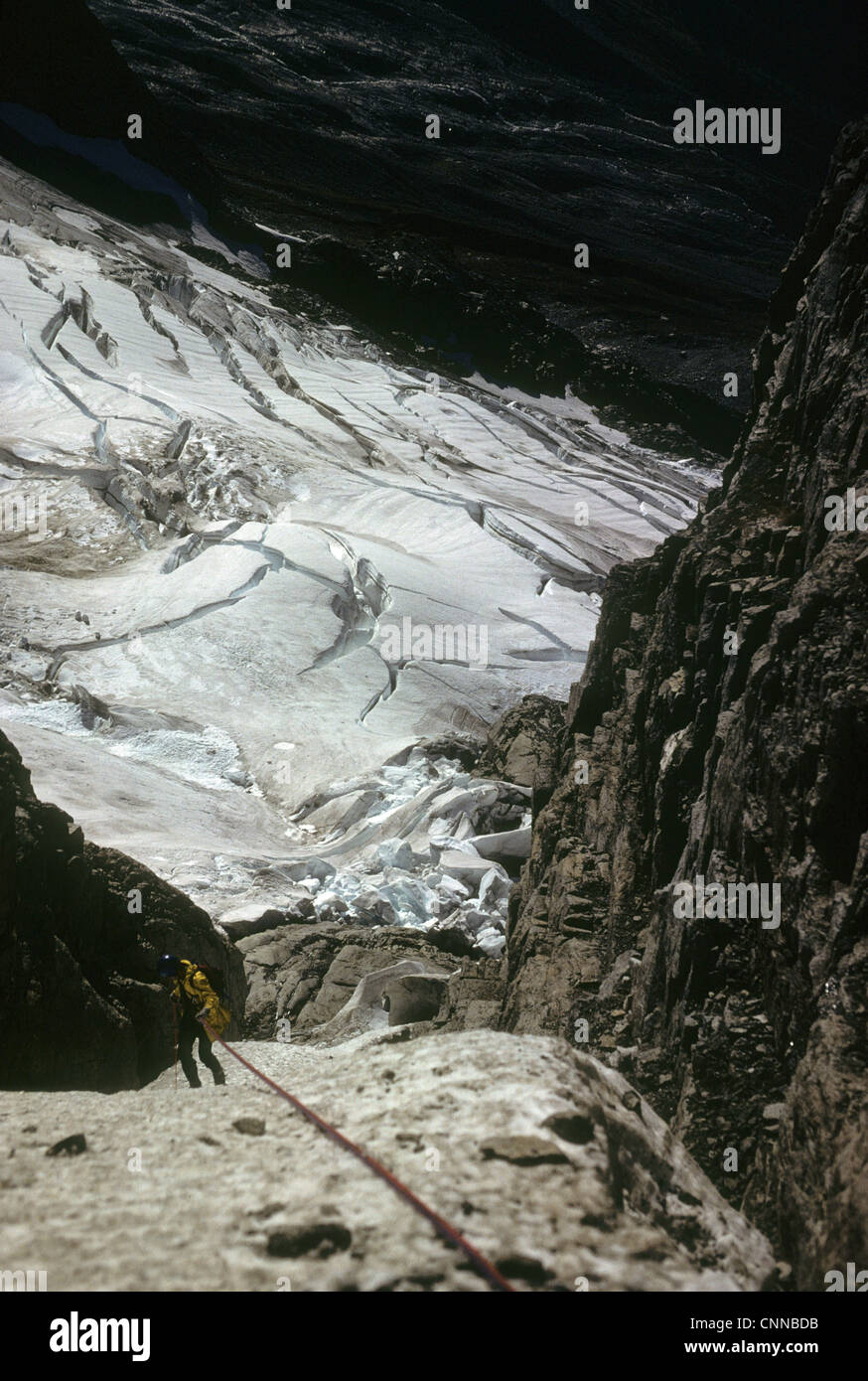 Climber rappelling, West Ridge, Forbidden Peak North Cascades National ...