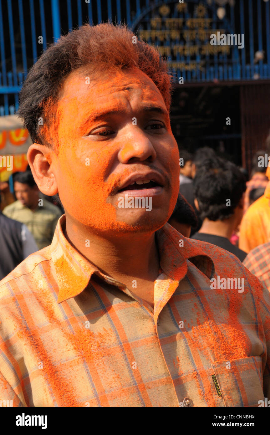 Nepali man covered in orange powder at the bisket jatra festival in ...