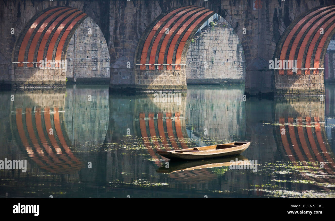 Bridge and boat on Wuyang River, Zhenyuan, Guizhou, China Stock Photo ...