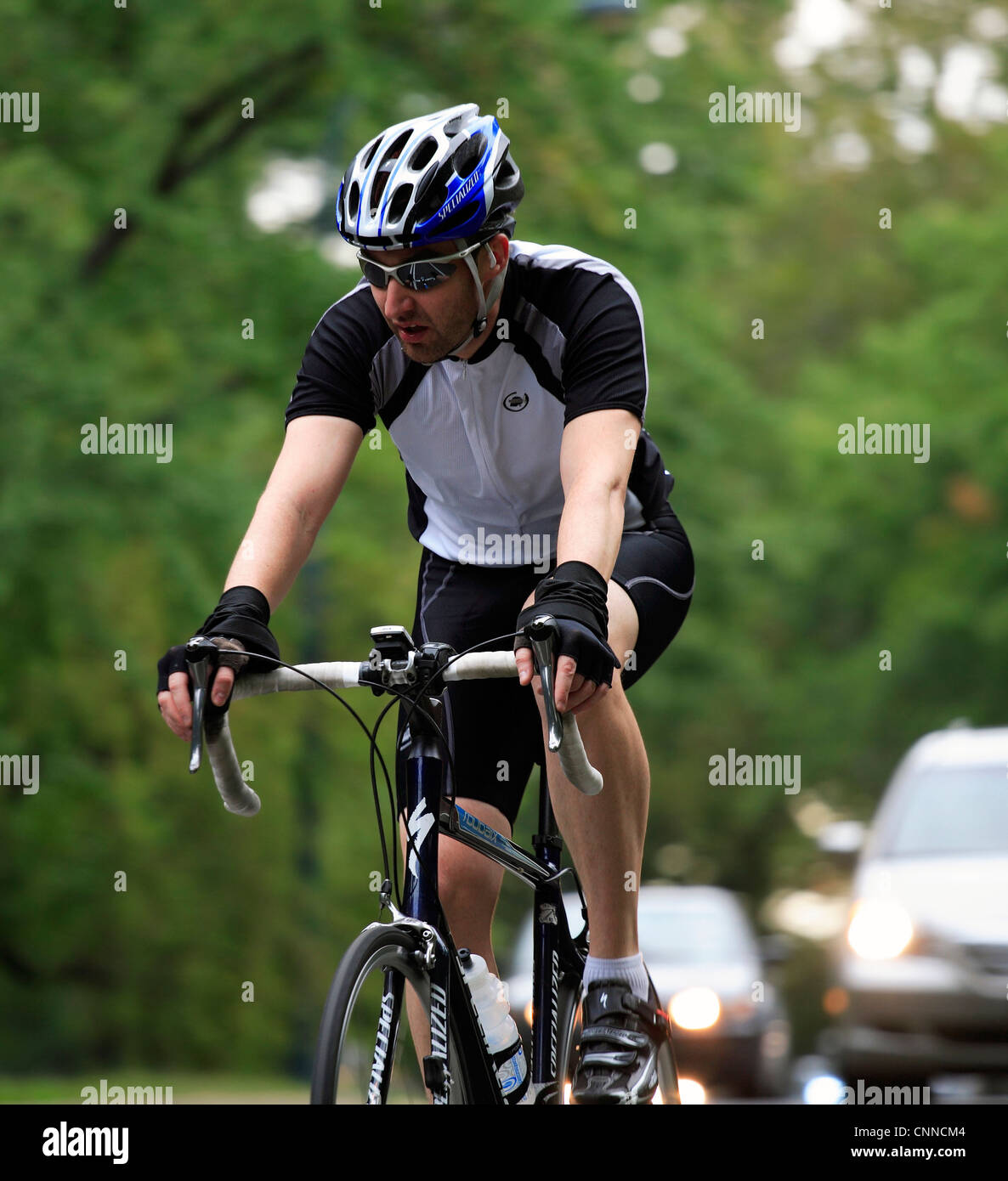 NEW YORK, NY - October 29: Early morning biker in Central Park riding ...