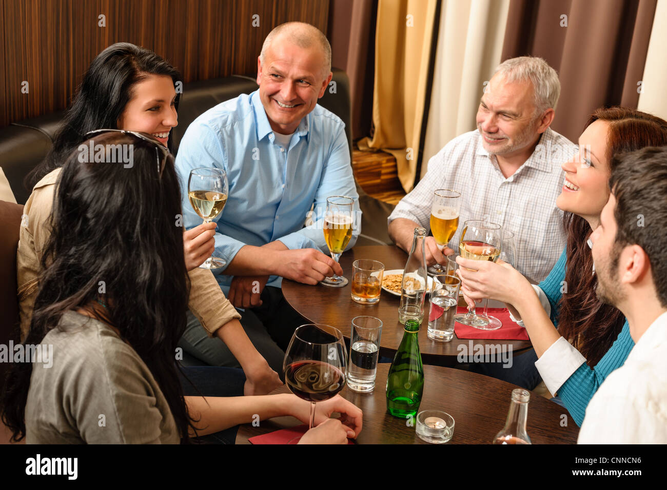 Drink after work happy colleagues having fun at fancy restaurant Stock ...