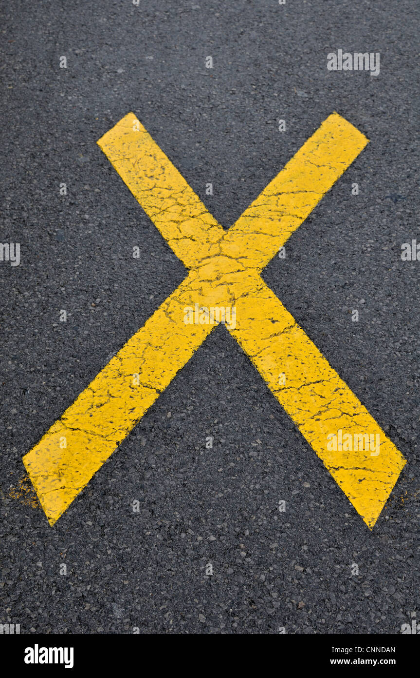 Yellow, X Marking on Road, Alps, France Stock Photo - Alamy