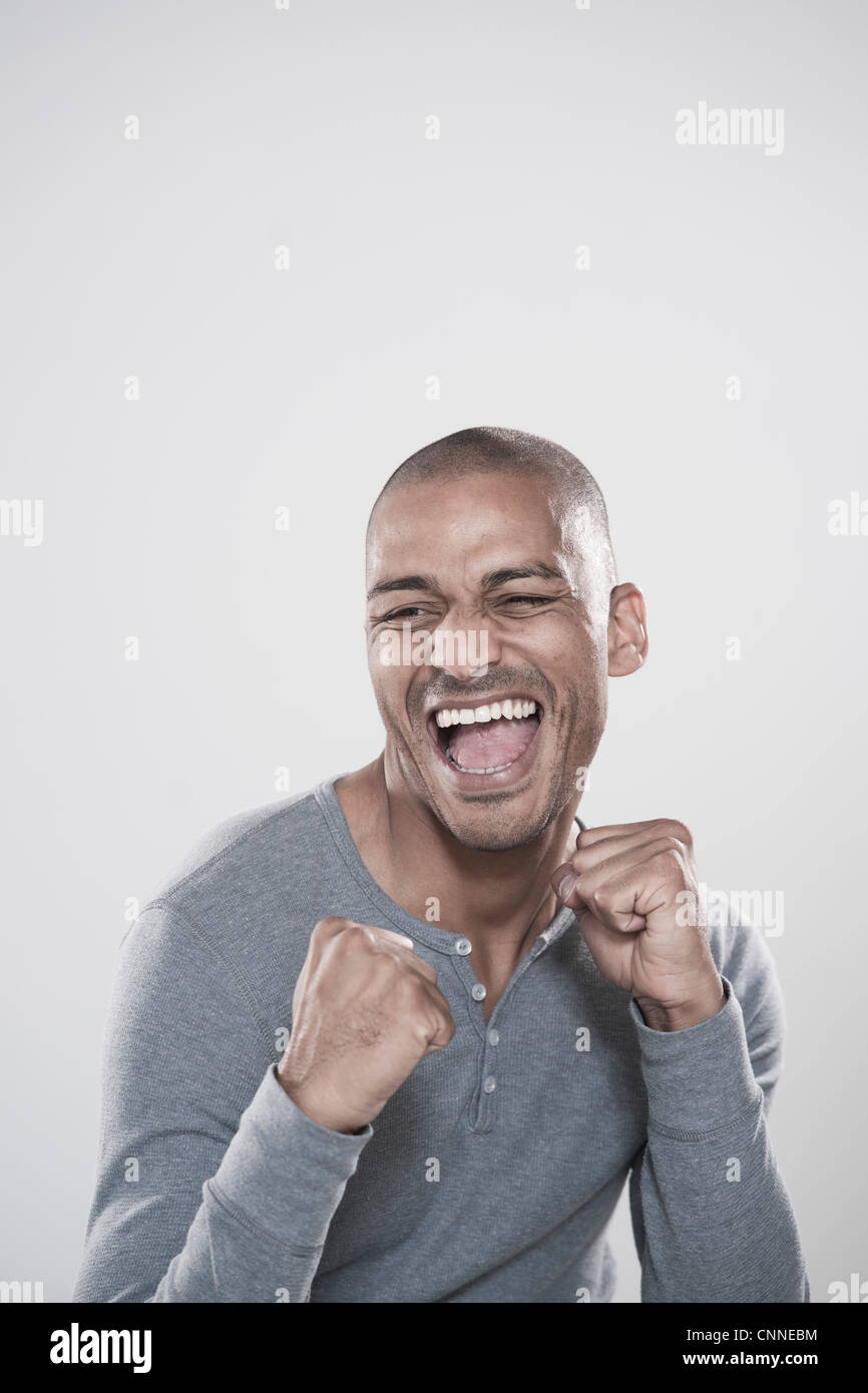 Portrait of Man Cheering Stock Photo - Alamy