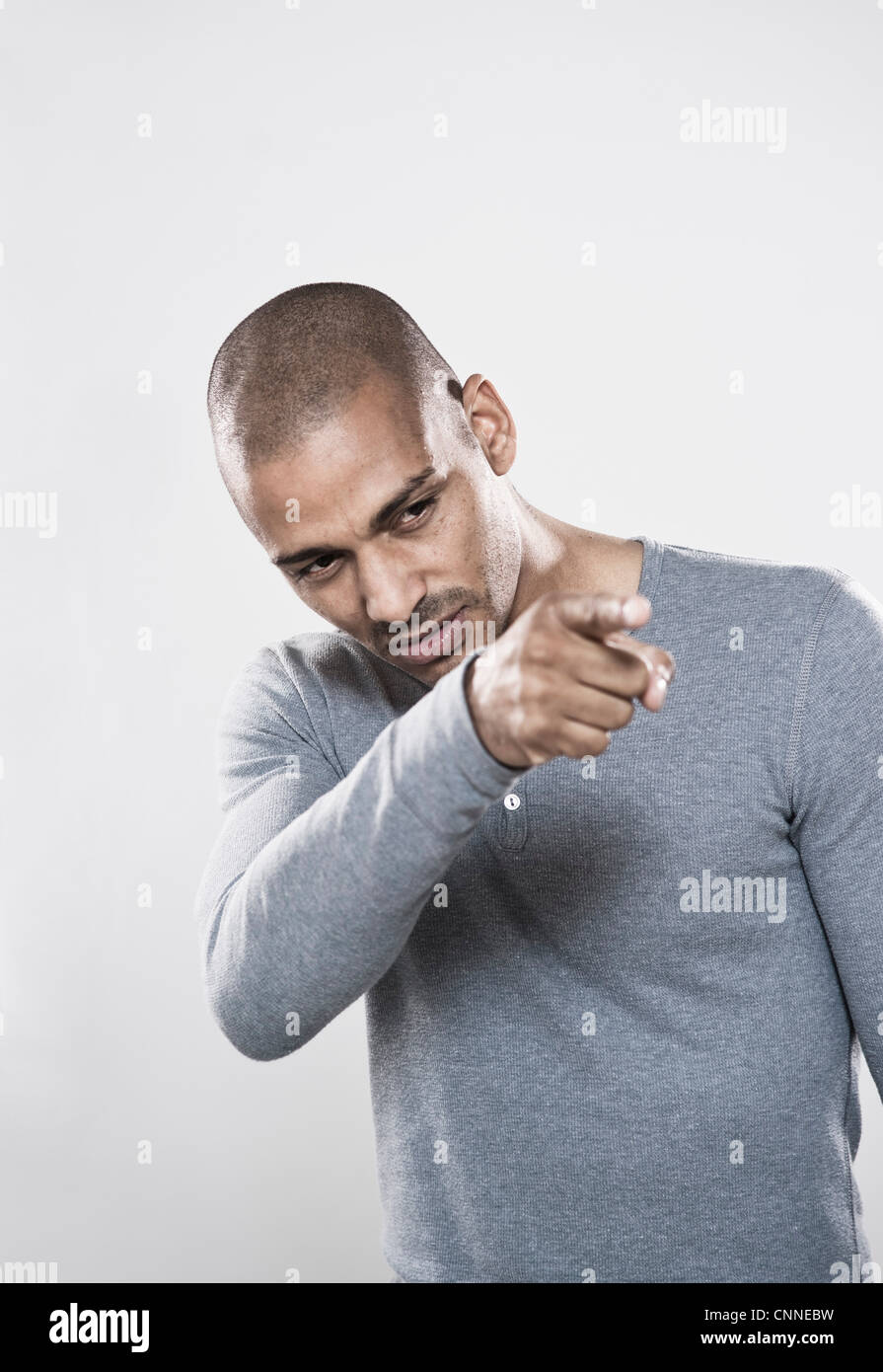 Portrait of Man Pointing Finger Stock Photo - Alamy