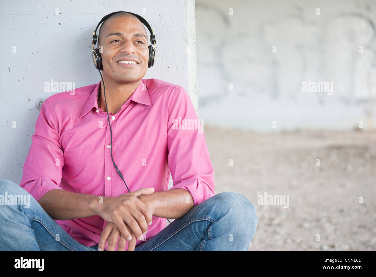 Portrait of Man using Headphones Stock Photo - Alamy