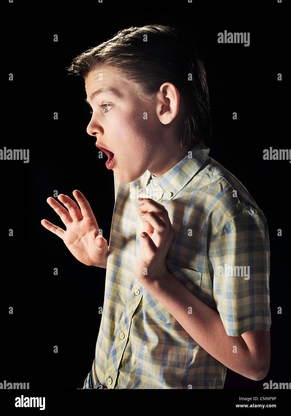 Frightened boy gasping Stock Photo - Alamy