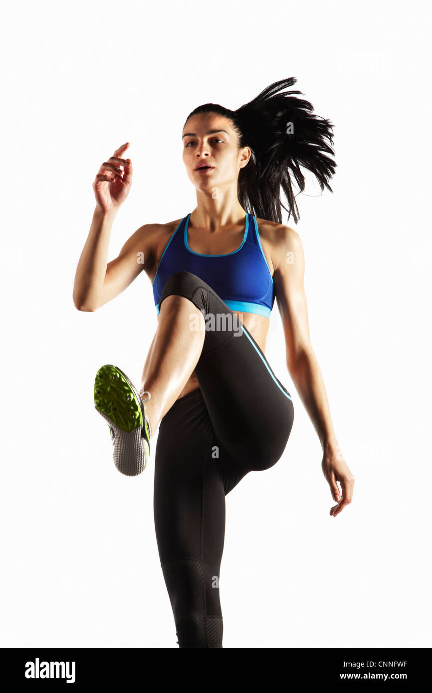 Athlete running in place Stock Photo - Alamy