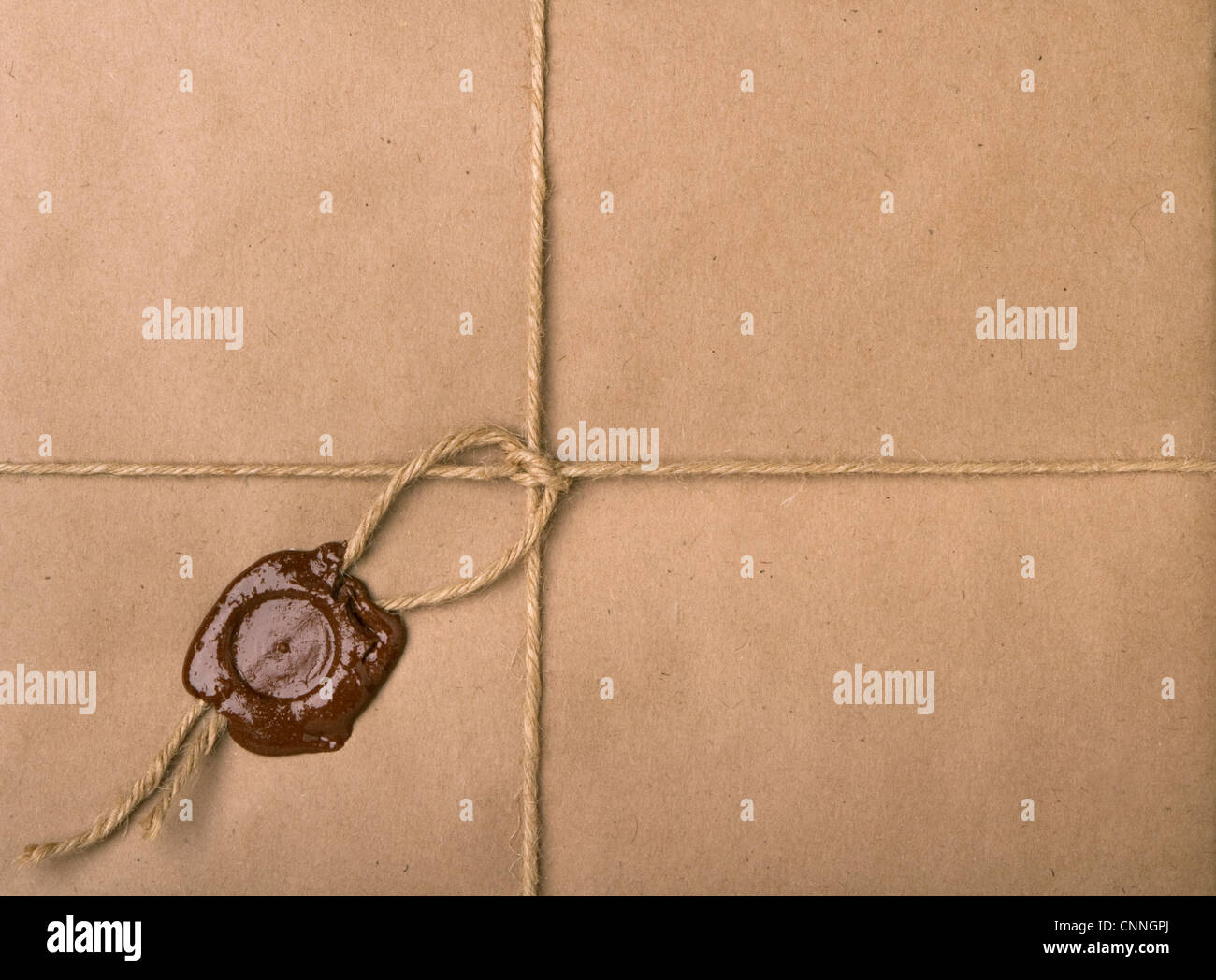 parcel with a rope and wax, fragment Stock Photo - Alamy