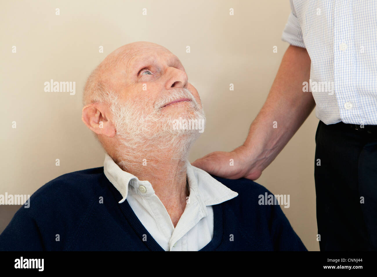 Patting on shoulder hi-res stock photography and images - Alamy