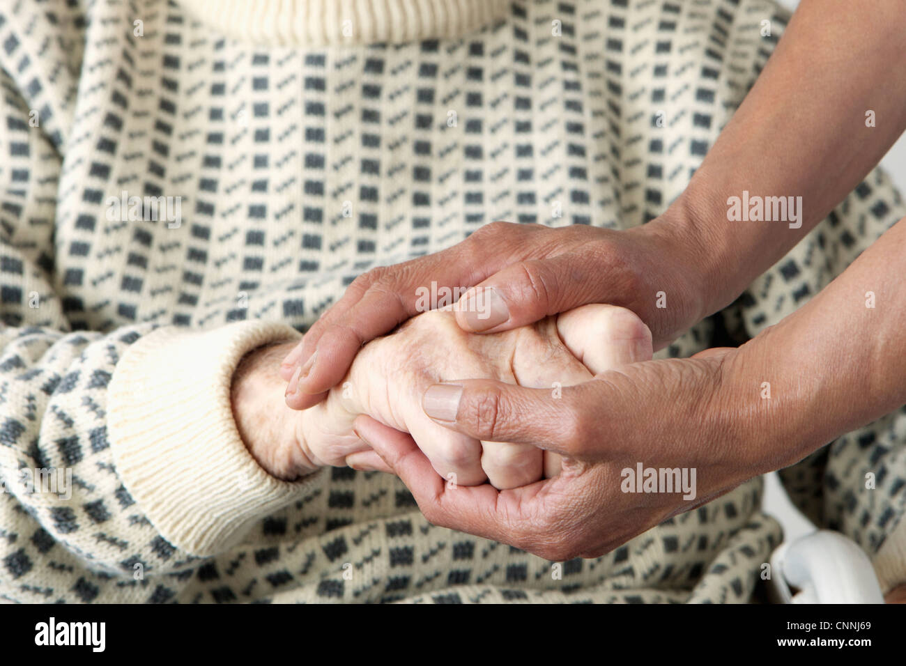 Patting arm hi-res stock photography and images - Alamy