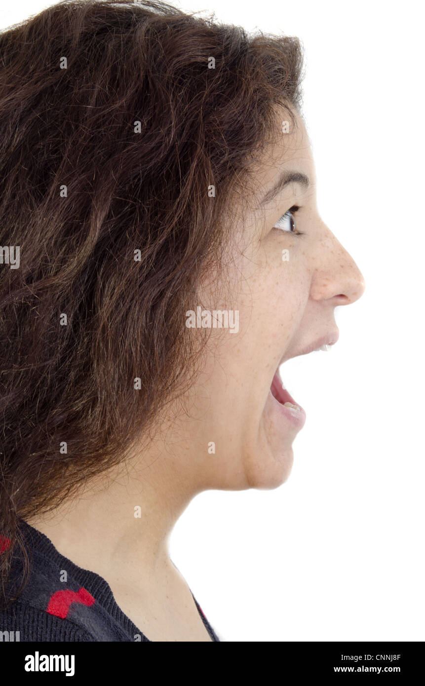 young woman screams loud mouth wide open Stock Photo - Alamy