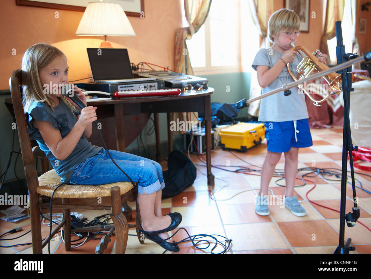 Children singing and playing music Stock Photo - Alamy