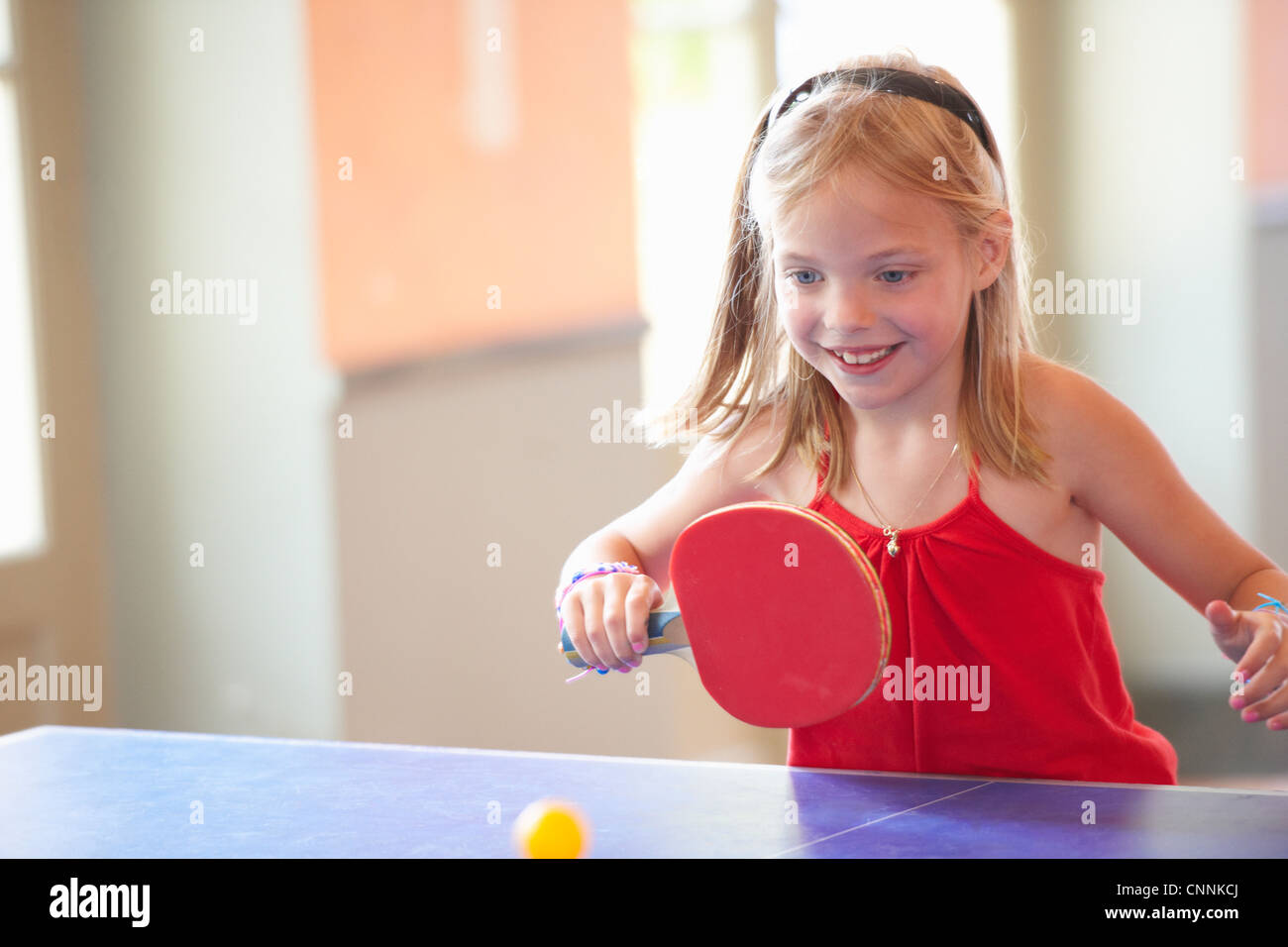 Girl playing table tennis Stock Photo - Alamy
