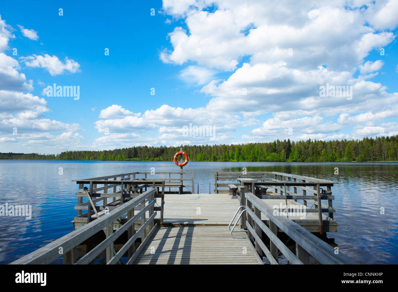 Wooden dock in rural lake Stock Photo - Alamy