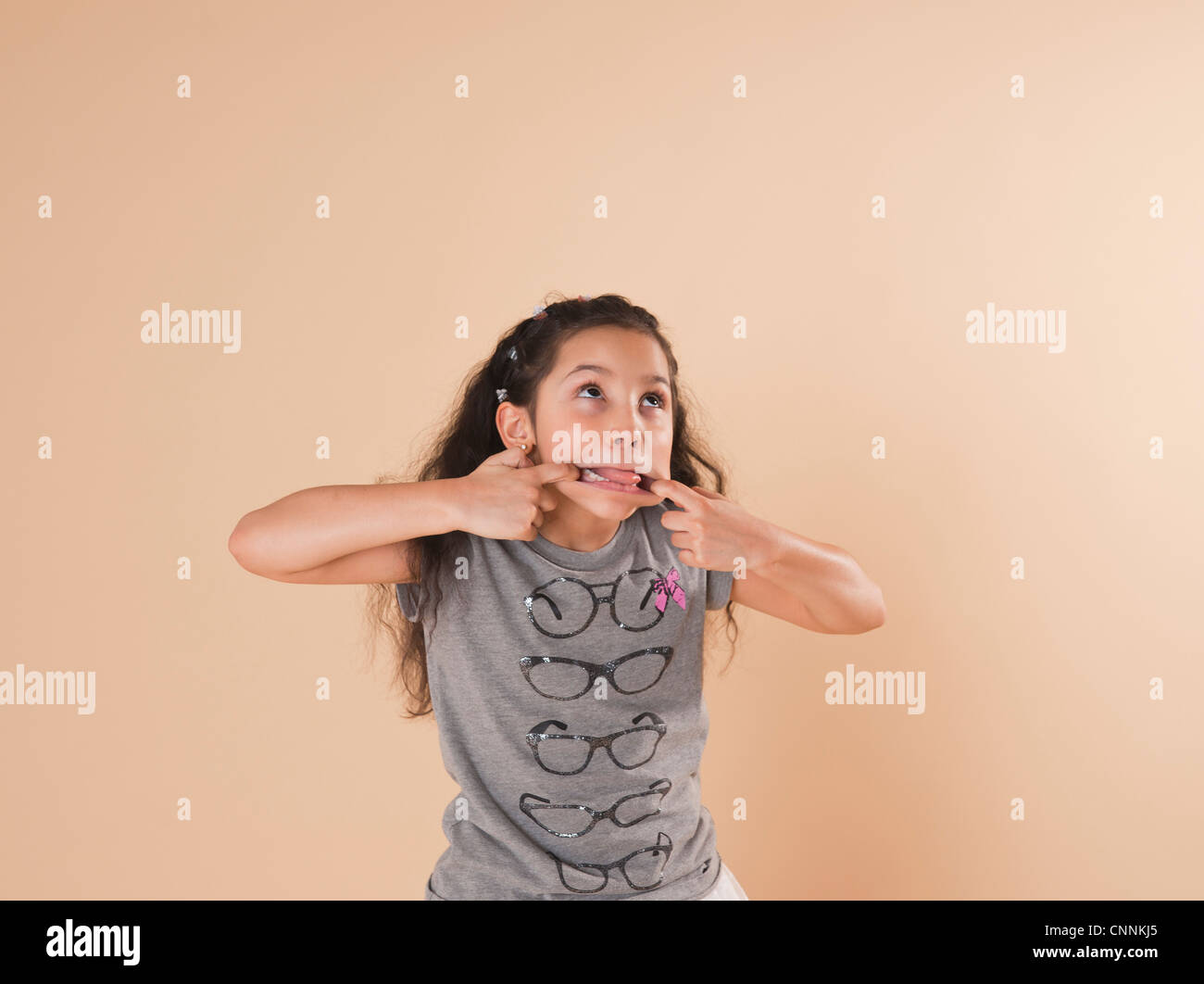 Portrait of Girl Making Faces Stock Photo - Alamy