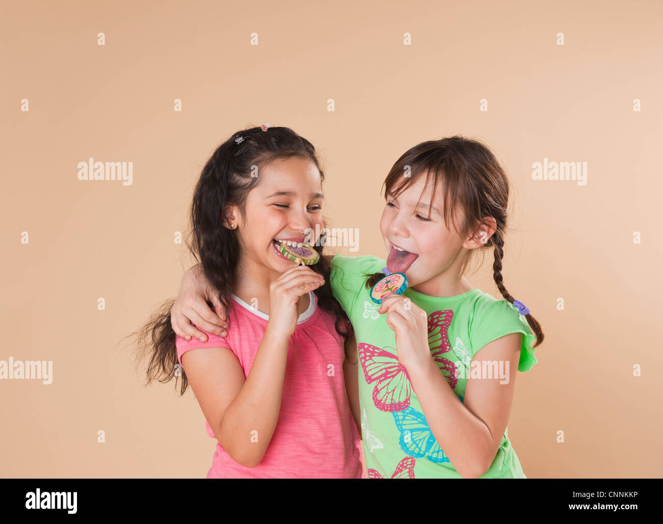 Portrait of Girls Eating Candy Stock Photo - Alamy