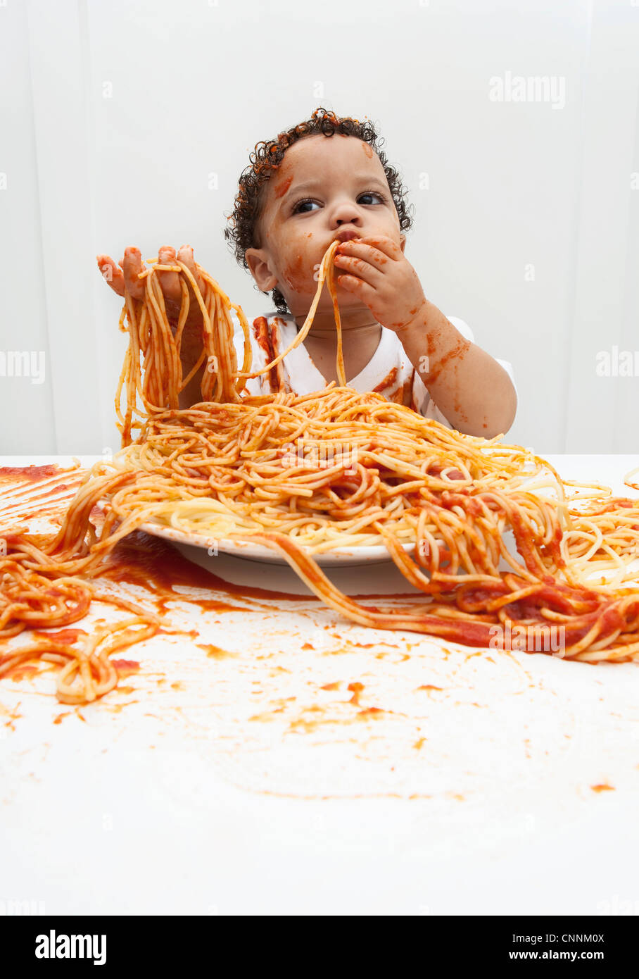 Toddler hands spaghetti hi-res stock photography and images - Alamy
