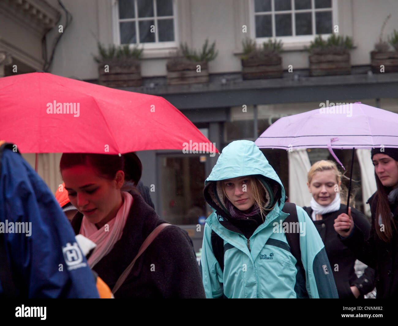 Trying to stay dry hi-res stock photography and images - Alamy