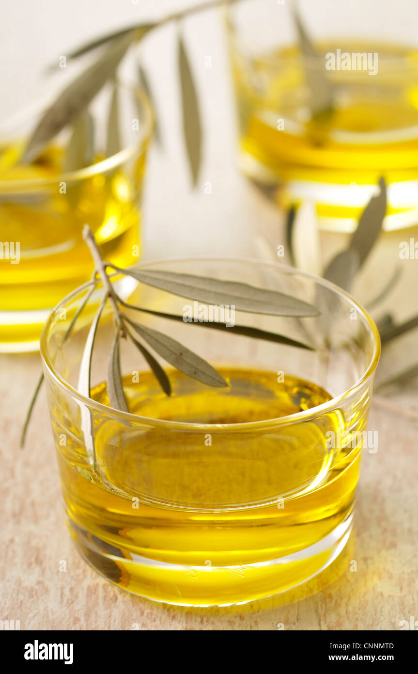 Three glasses with oil hi-res stock photography and images - Alamy