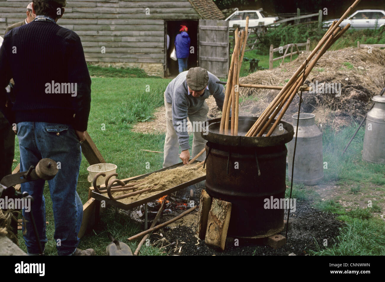 Walking stick making, man using traditional methods, Singleton, Sussex ...