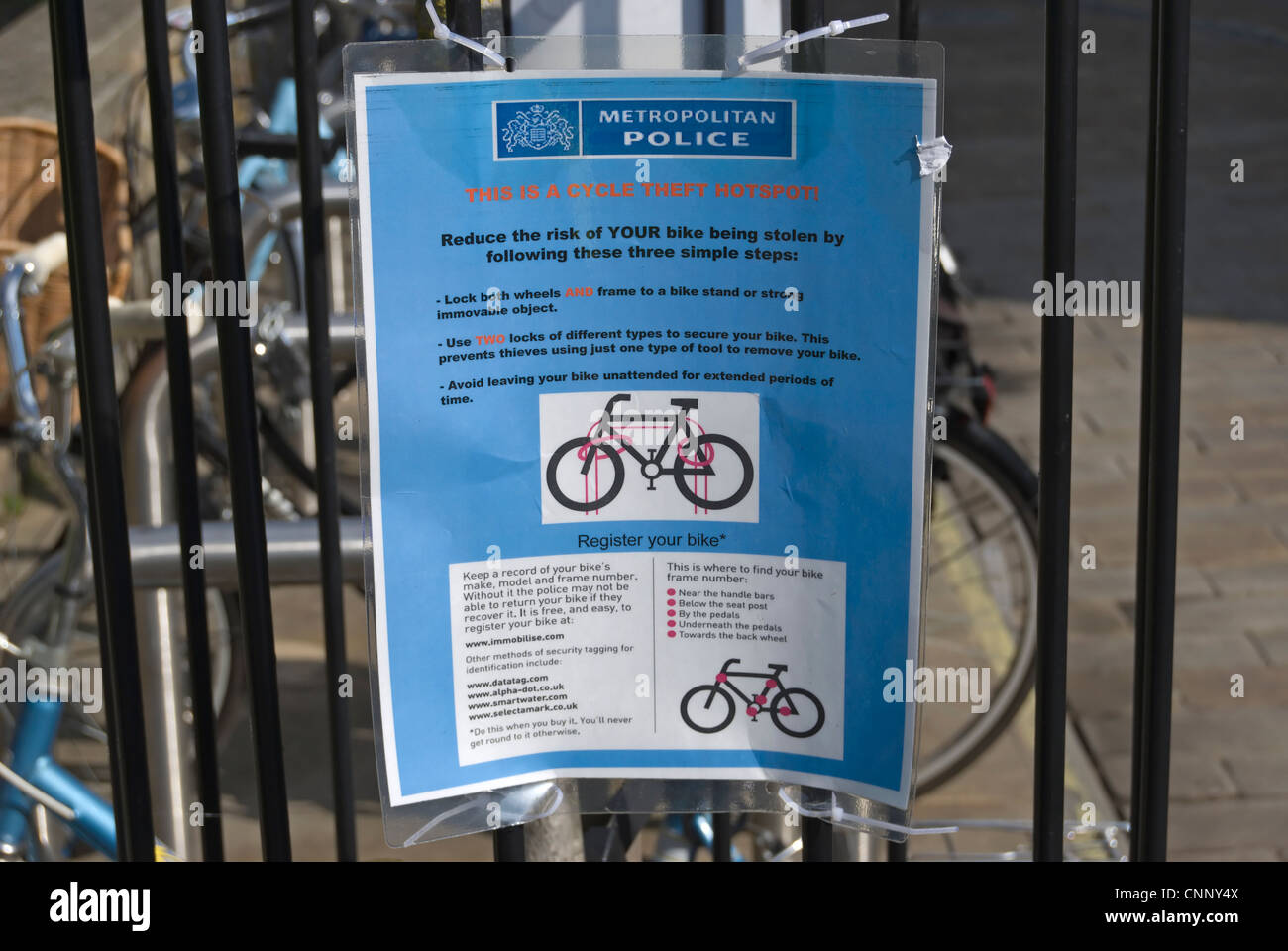 metropolitan police sign warning of a cycle theft hotspot, in kingston ...