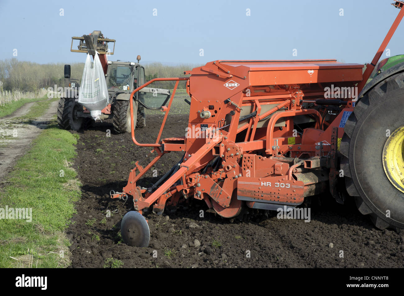Seed drill and telehandler with bag of seed, drilling Westminster ...