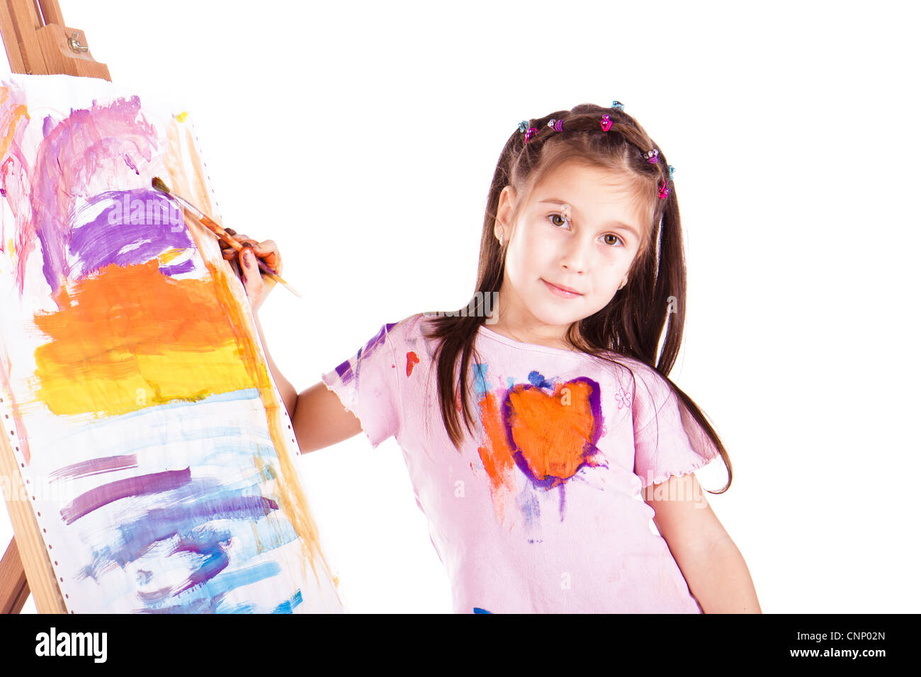 Beautiful little girl painting over white background Stock Photo - Alamy