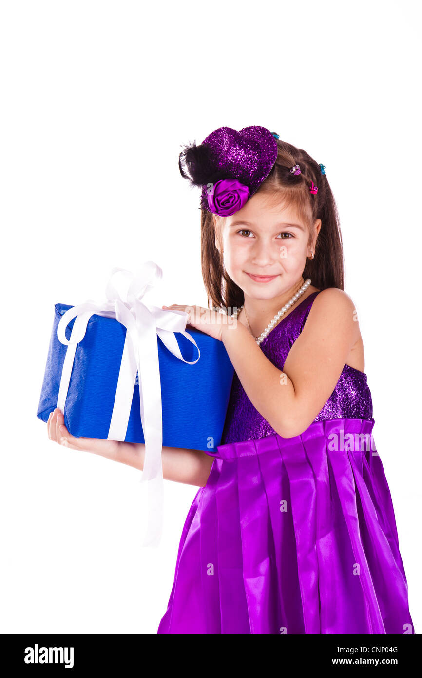 Beautiful little girl with presents over white background Stock Photo ...