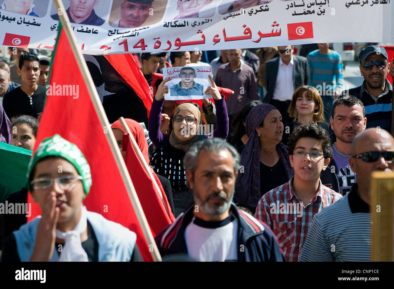 Tunisia, Tunis: Women and men mourning their sons who died during the ...