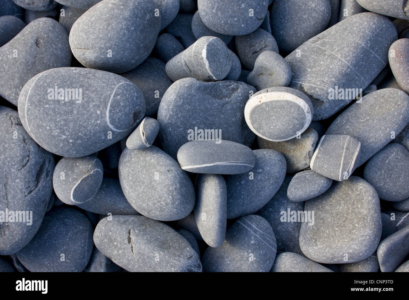 Rounded stones on beach hi-res stock photography and images - Alamy