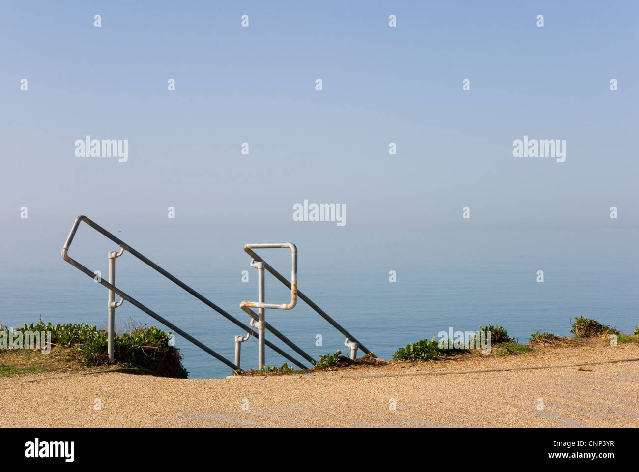Cliff steps - at the top - down to beach - sunlight blue sky - seascape ...