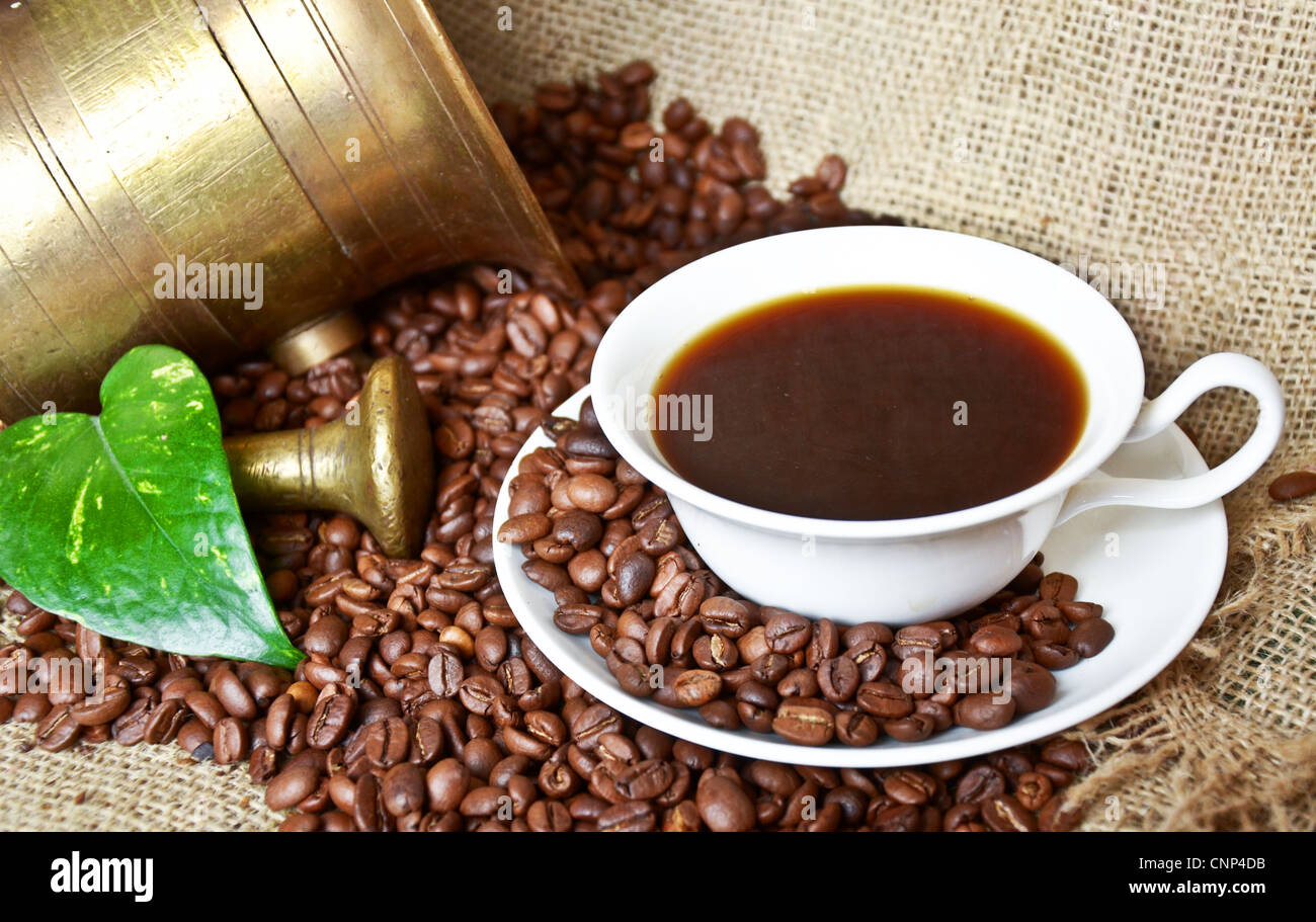 Coffee bacground with mill cup and sack Stock Photo - Alamy