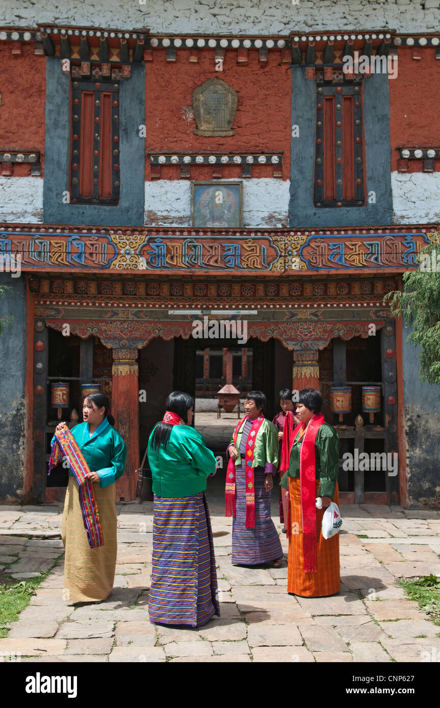 Asia, Bhutan, Bumthang. Women wearing traditional Kira dresses at ...