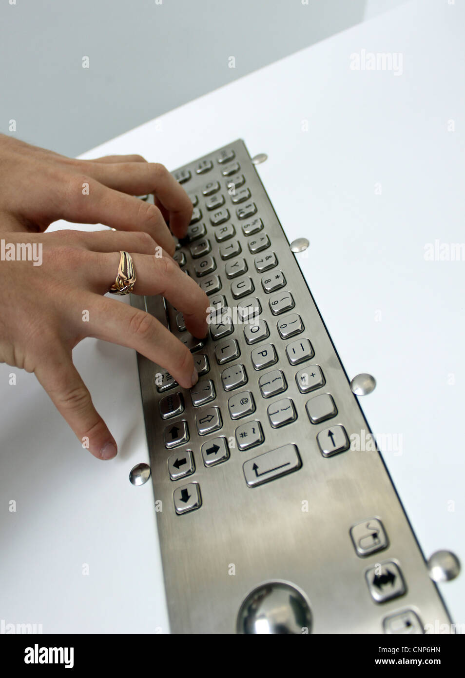Someone typing on a keyboard Stock Photo - Alamy