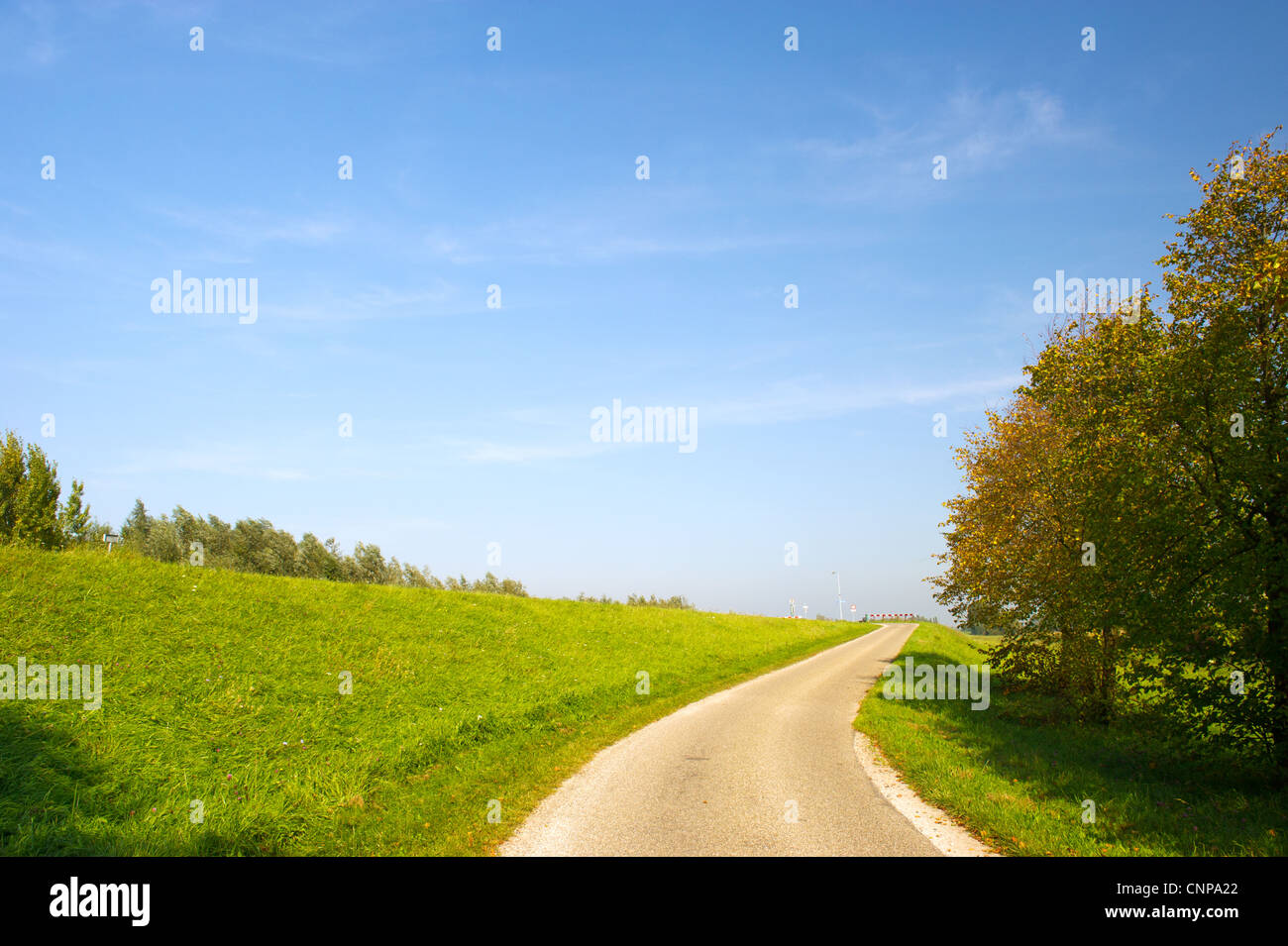 Dutch bike path is going on the dike Stock Photo - Alamy