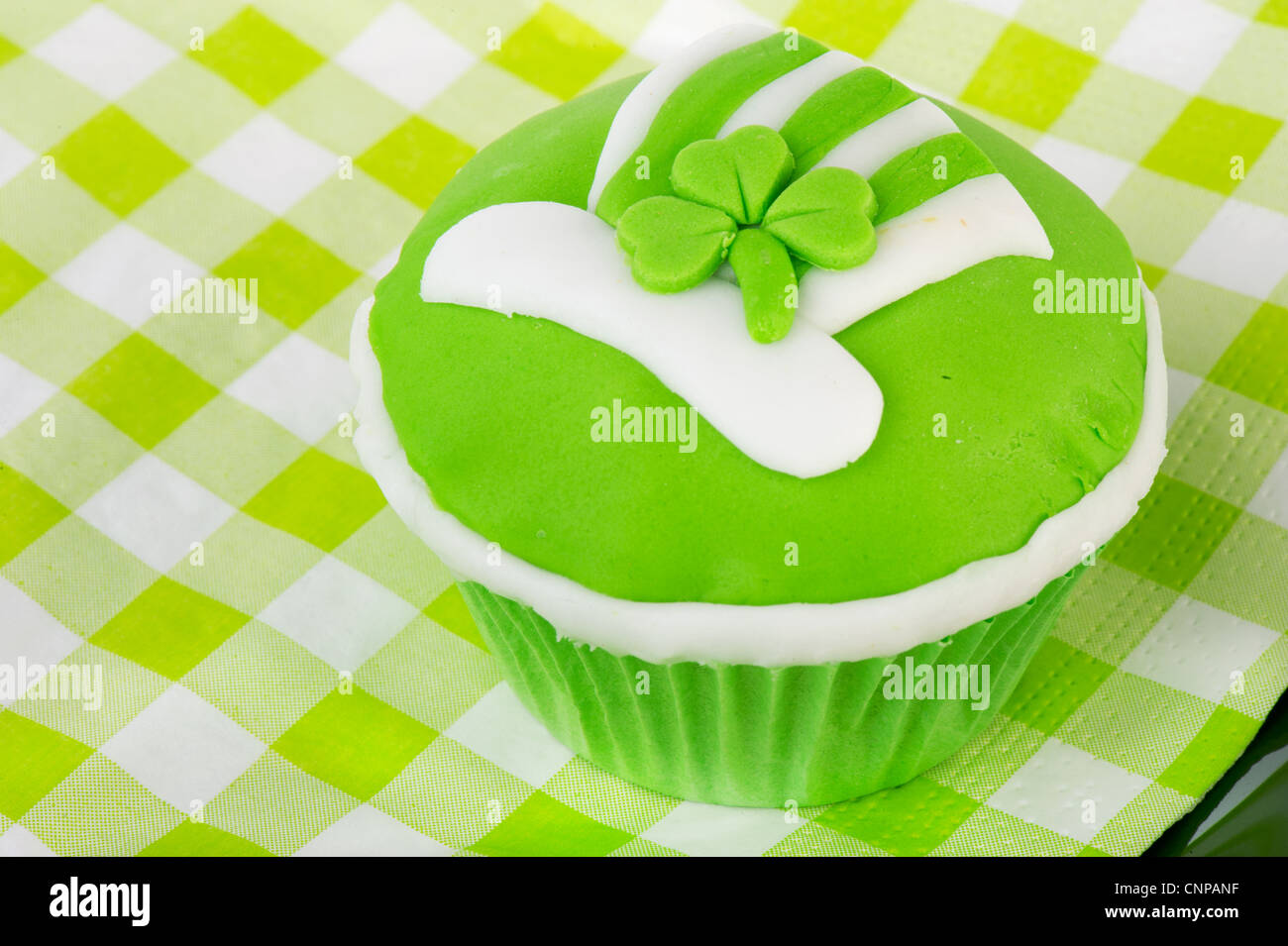 Green cupcake with head and shamrock for Saint Patrick's day Stock ...