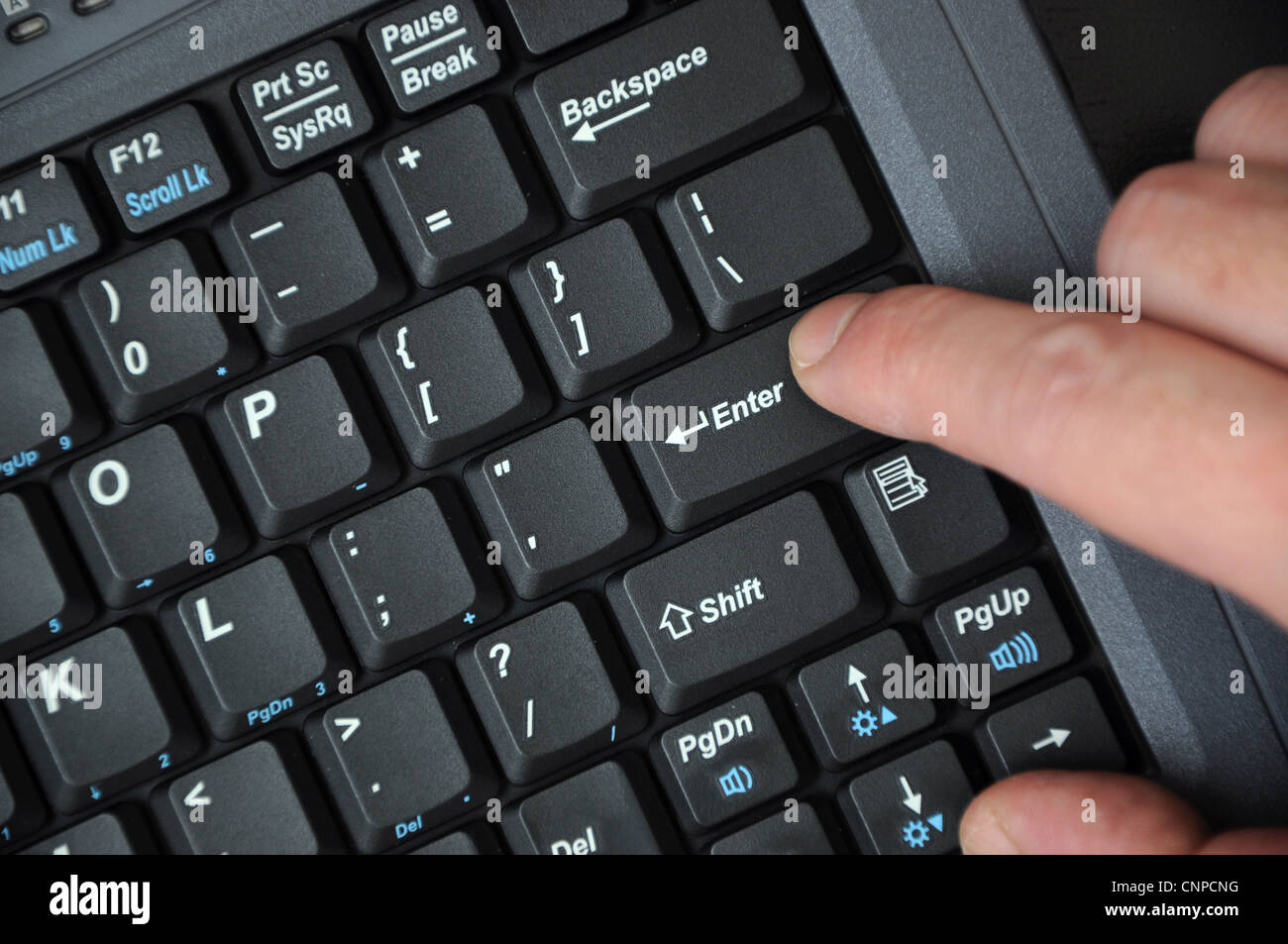 Black computer keyboard with hands Stock Photo - Alamy