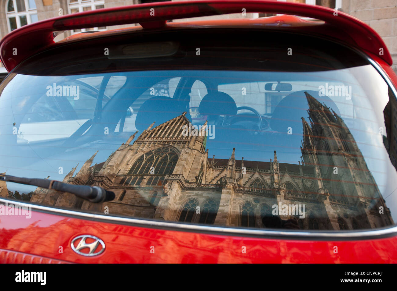 St. Peter's Cathedral reflected in car window in Regensburg, Germany ...
