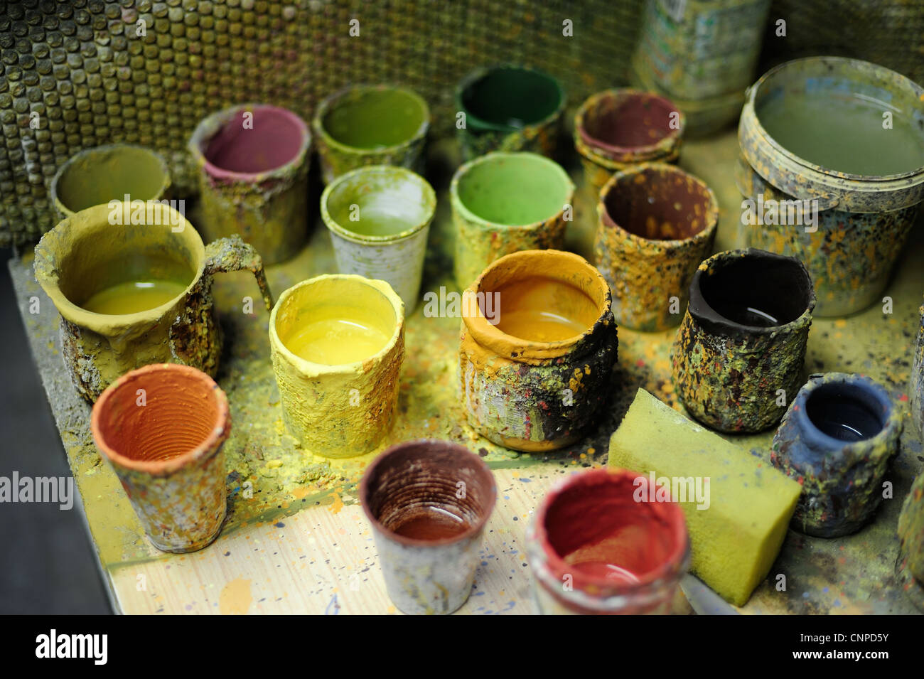 The painter's tools, colors and brushes, in a workshop Stock Photo - Alamy
