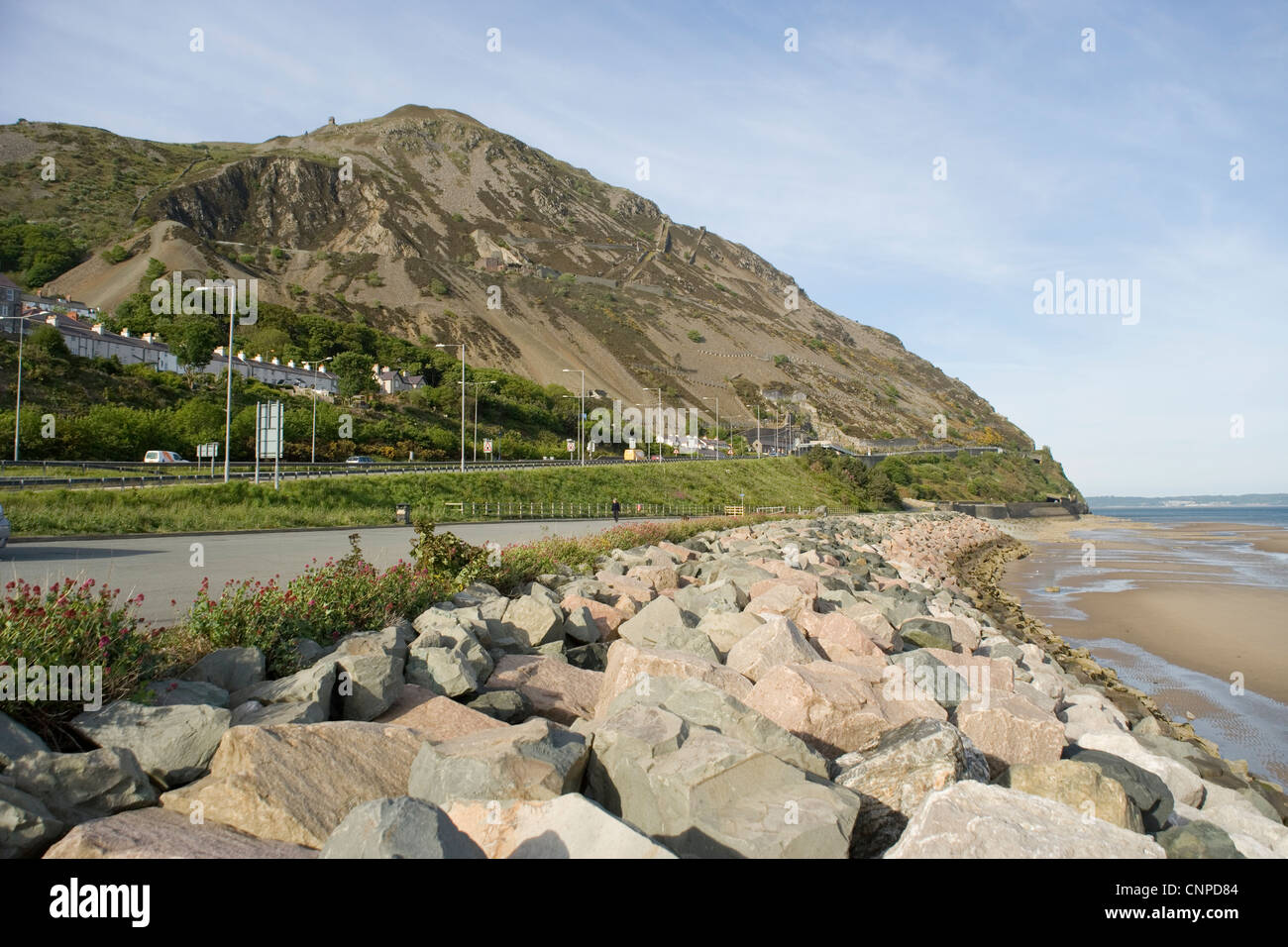 Pen y Clip tunnel and the beach from Penmaenmawr in North Wales Stock ...