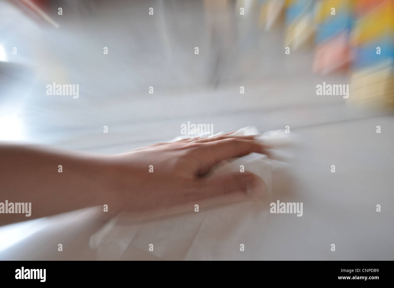Hand in motion wiping kitchen counter Stock Photo - Alamy