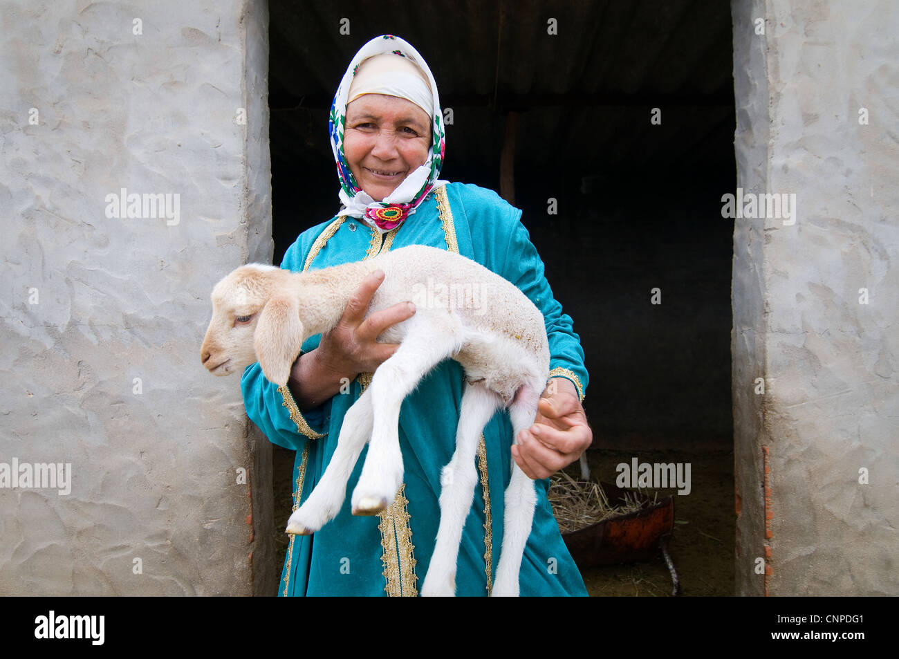 Middle eastern woman smiling village hi-res stock photography and ...