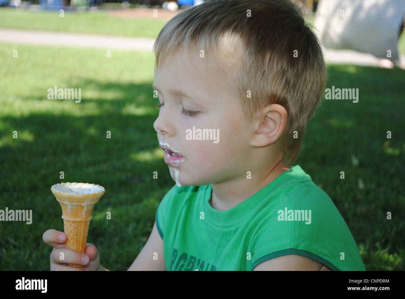 little boy eating ice cream Stock Photo - Alamy