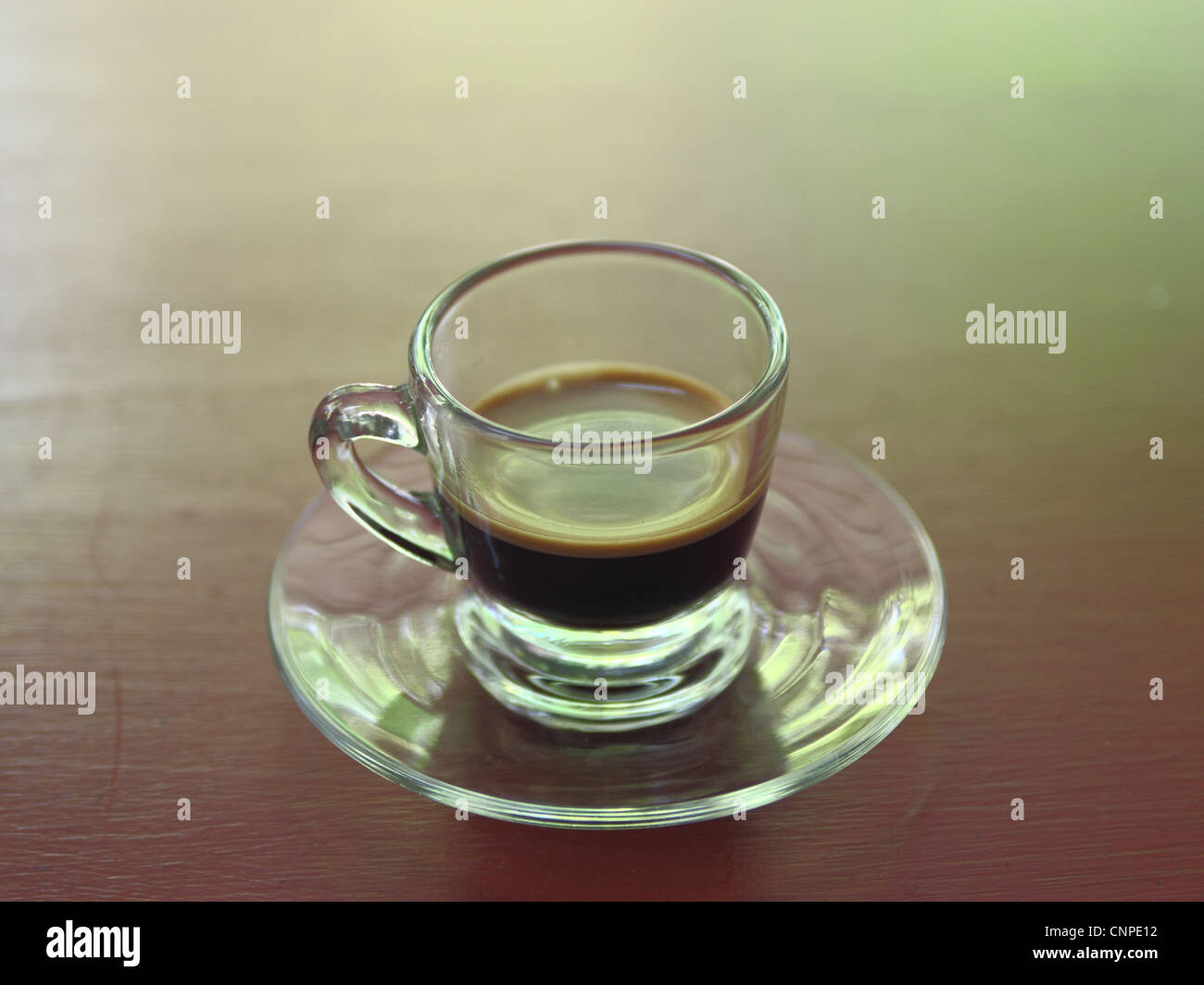 Close-up Espresso coffee on brown background Stock Photo - Alamy